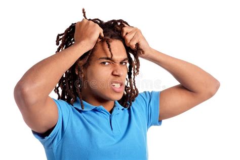 Young Man Pulling His Hair Against White Background Stock Image Image