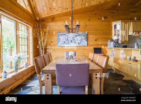 Oak Wood Dining Table With Caramel Coloured High Back Leather Chairs Plus Two High Back End