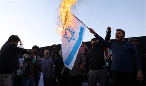 Iranians Burn Israeli Flag At Tomb Of Esther And Mordechai The
