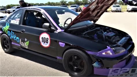 Check Out This Mitsubishi Four Banger Smoking Supercars On The Drag