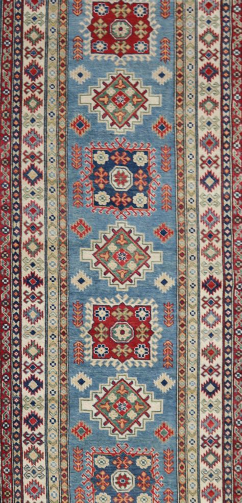 Lot An Afghan Veg Dye Kazak Runner 598 X 99cm A Finely Knotted