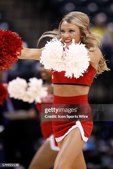 A Nebraska Cheerleader Performs During The Womens Big Ten Tournament