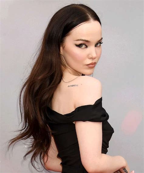 Dove Cameron Long Dark Brown Hairstyle