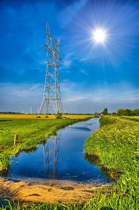 Dutch Landscape With A Canal And Grass Fields With Mirror Reflec Stock Image Image Of