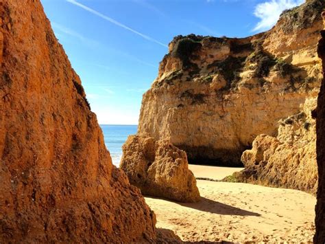 Premium Photo Rock Formations On Beach Against Sky