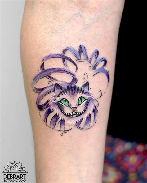 Minimalist Cheshire Cat Tattoo Elegant Design For Modern Skin Art