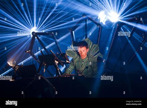 Orlando Higginbottom Of Totally Enormous Extinct Dinosaurs Performs On Stage At Camp Bestival
