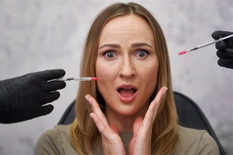 Premium Photo Portrait Of Shocked Woman Among Syringes