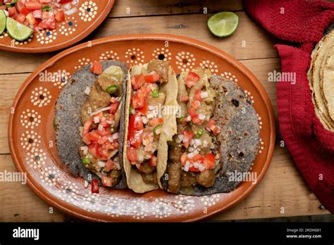 Chicharrones In A Green Sauce Tacos Served With Pico De Gallo Salad