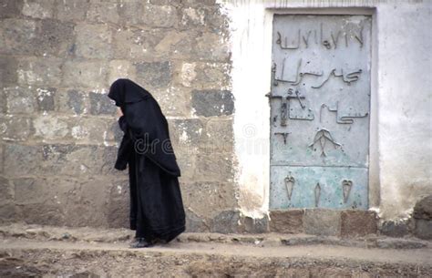 Yemeni Woman In Traditional Veil Walking In Sanaa Editorial Stock Image