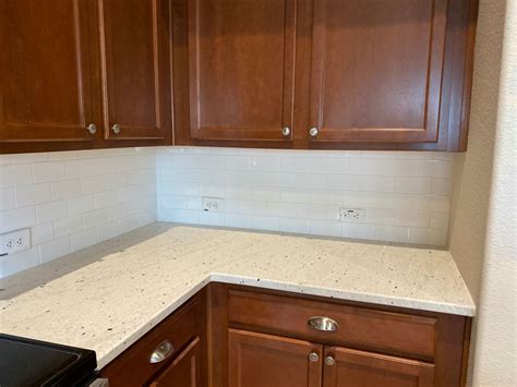 Pitaya White Granite And Subway Tile Backsplash