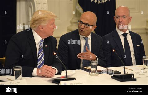 President Donald Trump L Listens To Microsoft Ceo Satya Nadella C