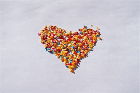 Premium Photo Multi Colored Heart Shape On White Background