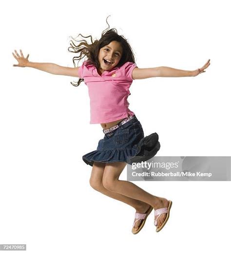 Girl Jumping In Skirt Photos And Premium High Res Pictures Getty Images