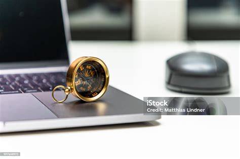 Compass And Laptop As A Symbol Of Orientation And Goals On The Internet
