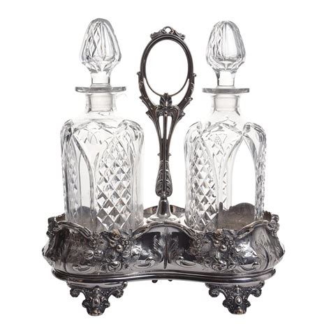 Silver Plate Repousse Tantalus Set Solvang Antiques