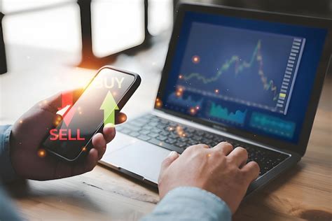 Premium Photo Hand Of Trader Holding Smartphone Looking At Stock