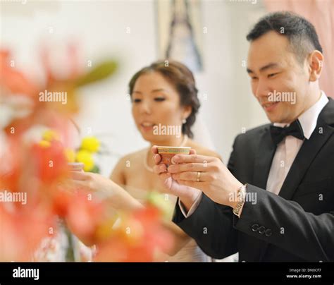 Traditional Chinese Wedding Tea Ceremony Bride And Groom Focus On