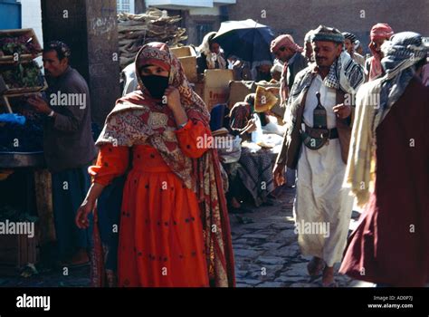 Sanaa Yemen Veiled Woman Wearing A Sanaani Sitarah Dress At Market