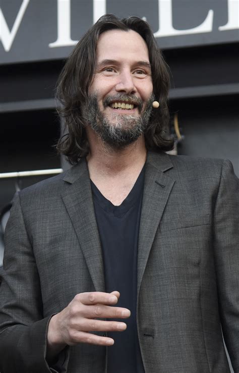 Keanu Reeves 59 Finally Cuts His Long Hair Sparking A Stir Photo