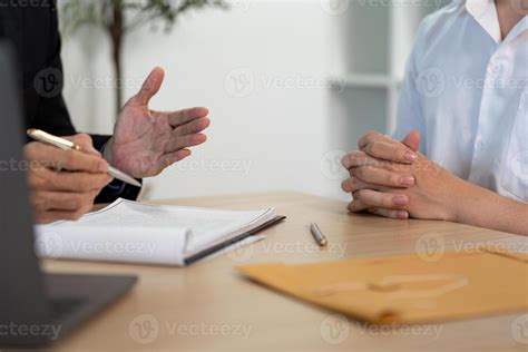 Insurance Consultation Agent Explaining Policy To Client 69499948