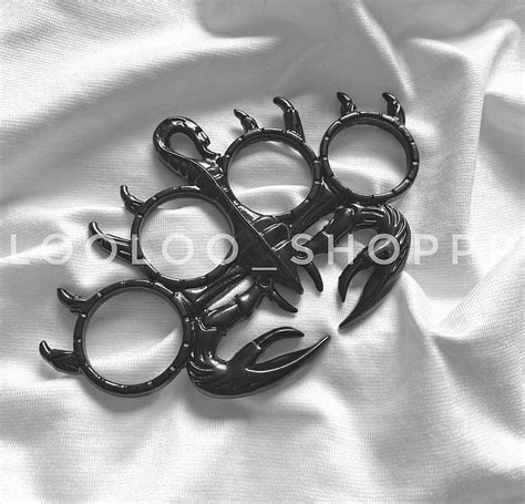 لولوشاپ پنجه بوکس عقرب