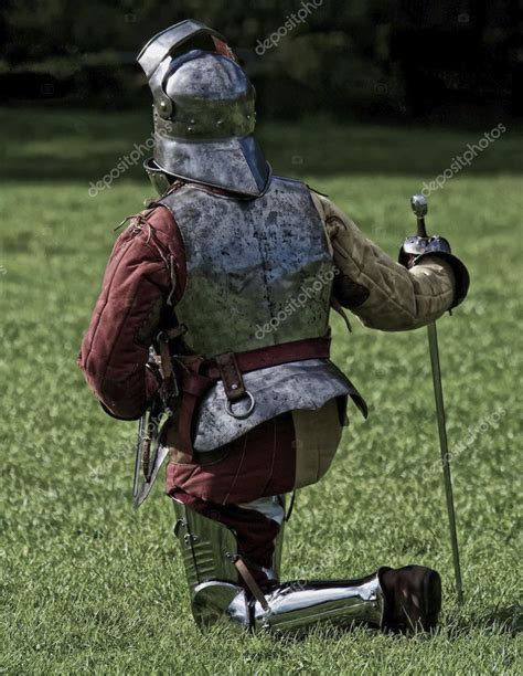Knight Kneeling With Sword