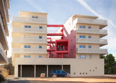 Pink Walls Frame Rooftop Garden Of Housing By Pietri Architectes