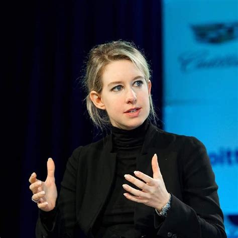 Why Elizabeth Holmes Reinvented Her Style From Her Steve Jobs Inspired