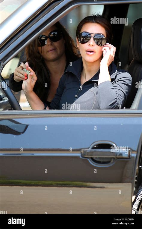 Kim Kardashian Talking On Her Cell Phone As She Leaves Barneys New York