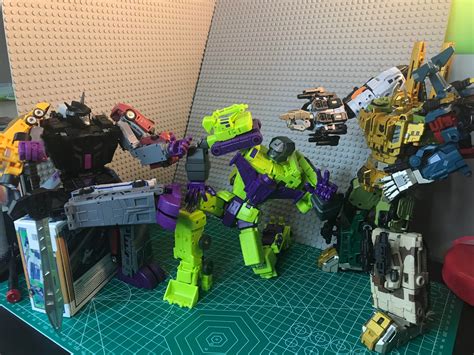 Devastator And Menasor And Bruticus Debating About The Philosophies Of Combiners Rtransformers
