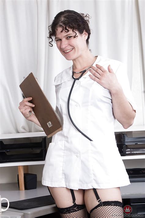 Mature Brunette Sunshine Shedding Doctor Garb Before Exposing Hairy