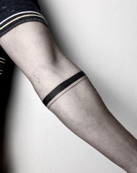 The 2 Lines Tattoo Meaning And The 32 Tattoos To Help You Line Up Your