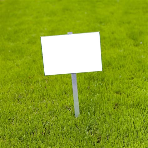 Premium Photo Sign On Grass With Isolated Copy Space For Caption