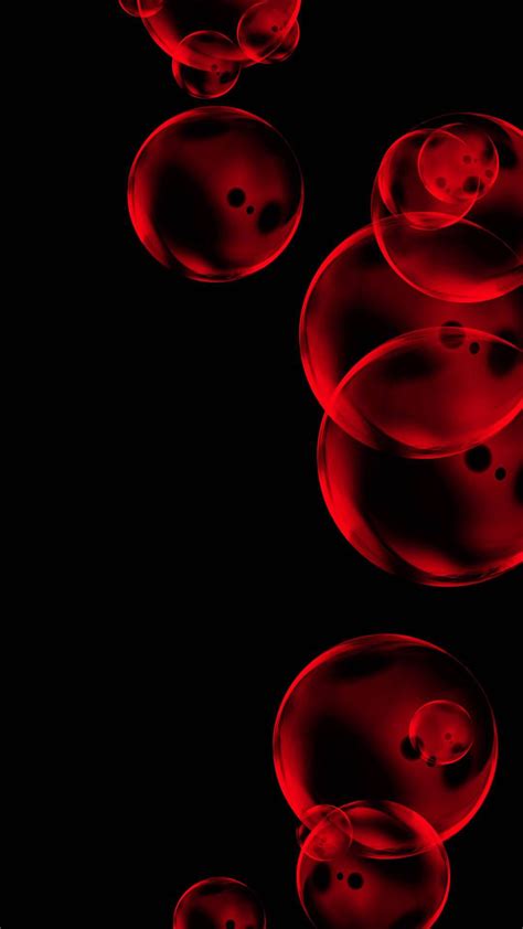 Red Bubbles Floating On Black Background