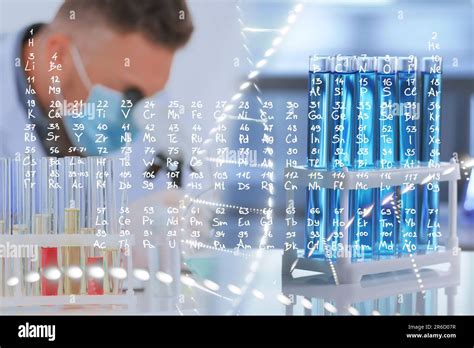 Scientist Working In Laboratory Test Tubes With Reagent And Periodic