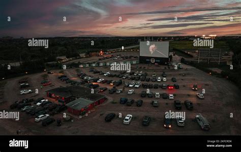 A Parking Lot And Movie Theater In Oakville Canada During The Sunset