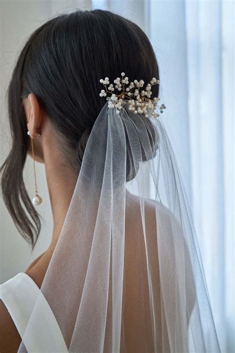 Bridal Bun And Veil Wedding Hairstyles With Pearl Veil Pearl Bridal