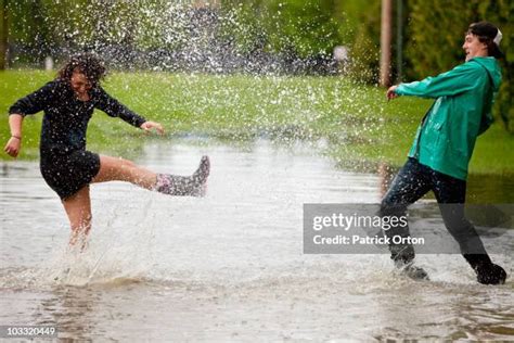Splash Puddle Day Photos And Premium High Res Pictures Getty Images