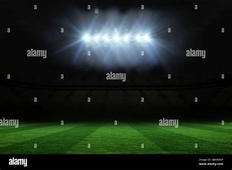 Illuminated Striped Grass Field Is Shining Inside Flat Stadium Design