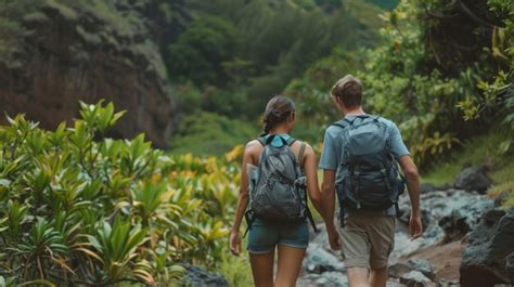 Young Multiracial Couple Hiking In Nature At Iao Valley State Park