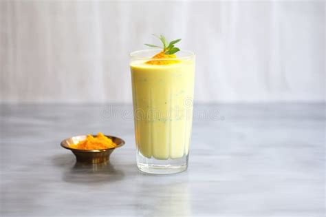 Lassi Glass With Swirls Of Mango Puree Stock Image Image Of Refreshment Swirl 305886433