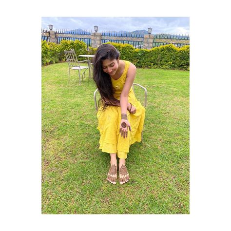 Sai Pallavi Stuns In A Yellow Palazzo Salwar Suit Fans Cant Stop Drooling Over Her Mehndi Design