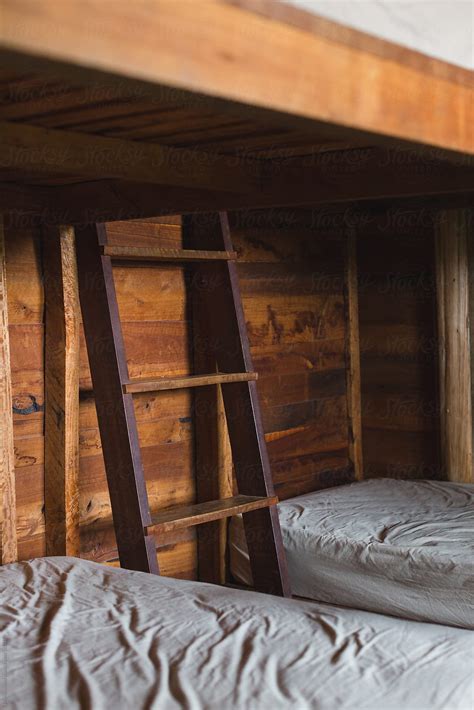 Bunks In Log Cabin By Stocksy Contributor Bri Hammond Stocksy