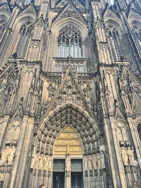 Premium Photo A Large Stained Glass Window Is Above The Large Windows