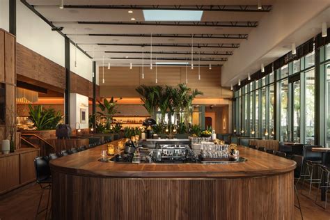 Michael Hsu Fills Houston Restaurant With Dark Wood And Green Accents