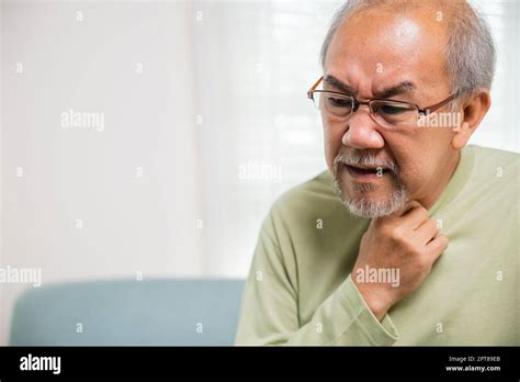 Retirement Senior Man Feeling Pain Use Hands Holding Neck And