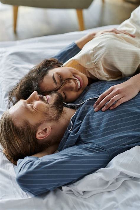 A Loving Couple Cuddles In Bed Stock Image Image Of Home Happy