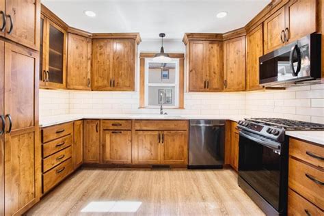 Knotty Alder Cabinets With White Countertops Cabinets Matttroy