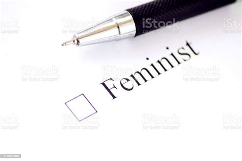 Feminist Checkbox With A Cross On White Paper With Pen Checklist